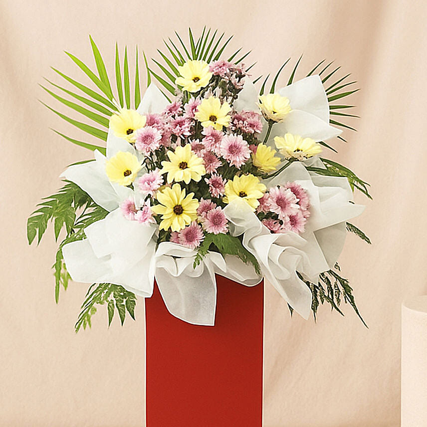 Online Gerberas Purple Pom In Beautiful Red Stand Gift Delivery in ...