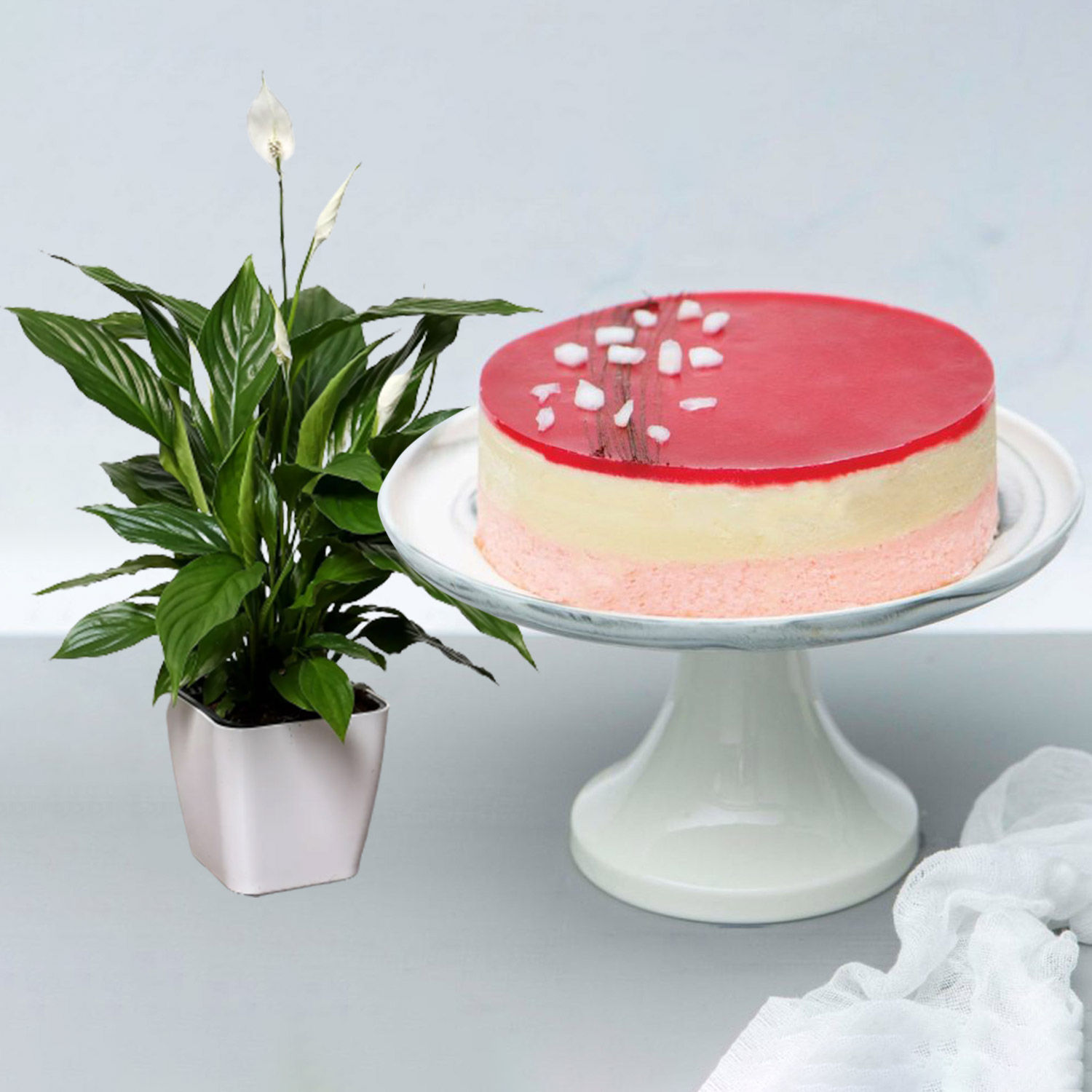 Online Raspberry Lychee Rose Cake With Lily Plant Gift Delivery in ...