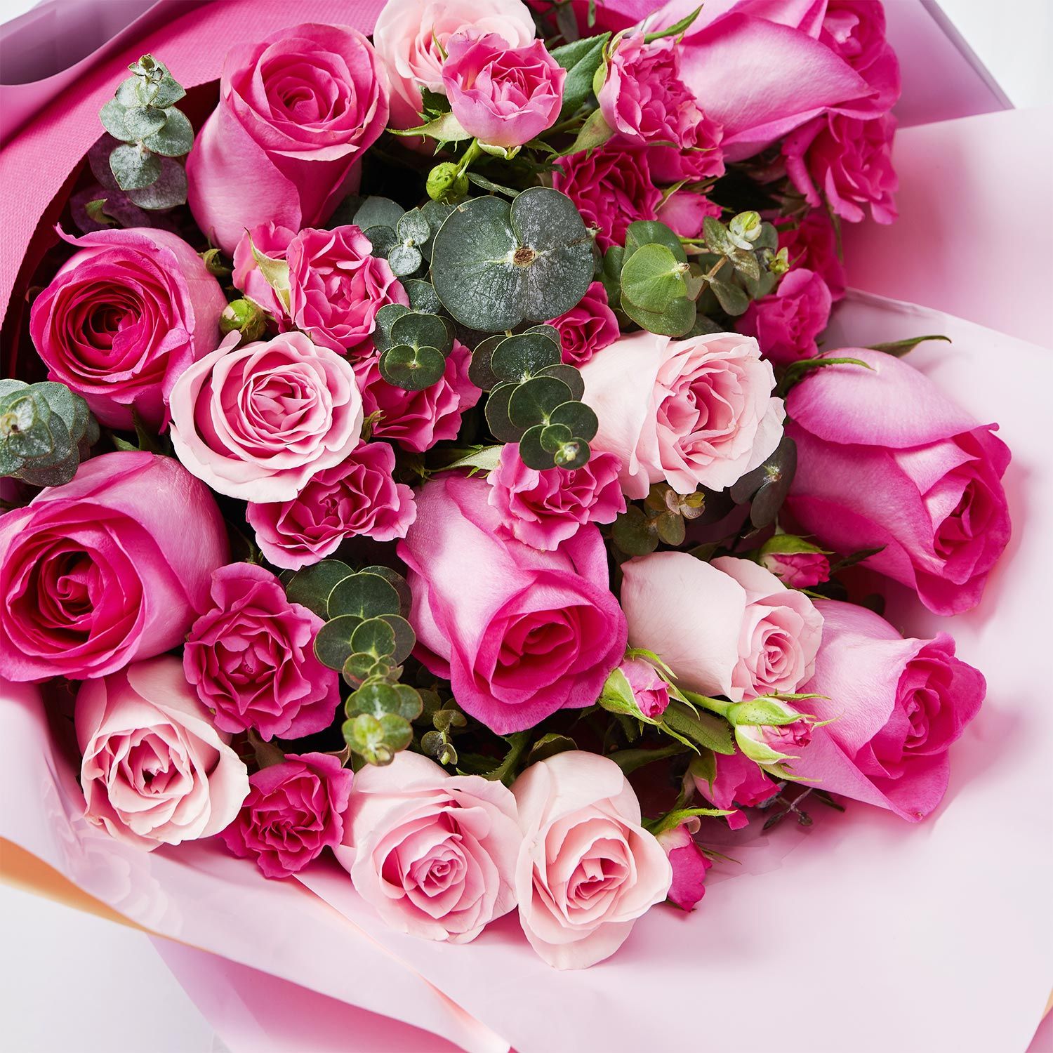 Online Magnificent Mixed Roses Wrapped Bouquet Gift Delivery in ...