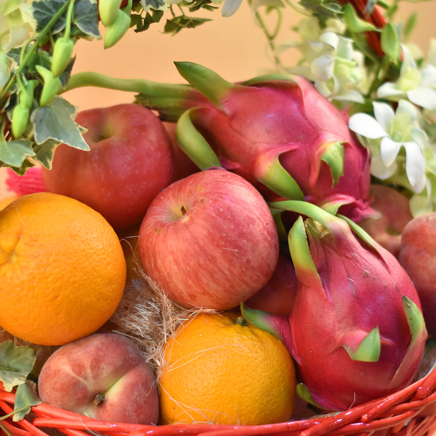 Online Dendrobium & Assorted Fruits Red Oval Basket Gift Delivery in ...