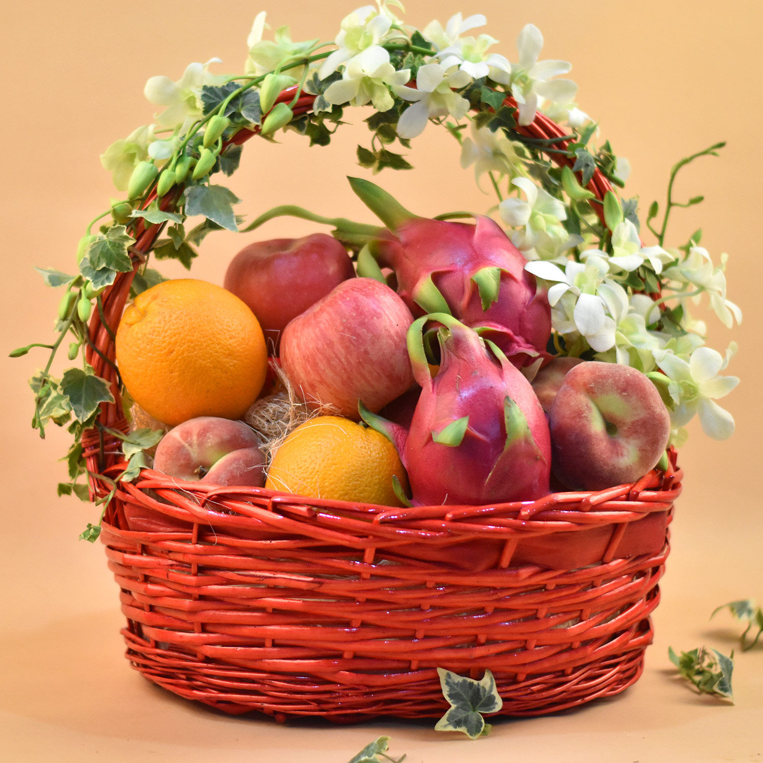 Online Dendrobium & Assorted Fruits Red Oval Basket Gift Delivery in ...